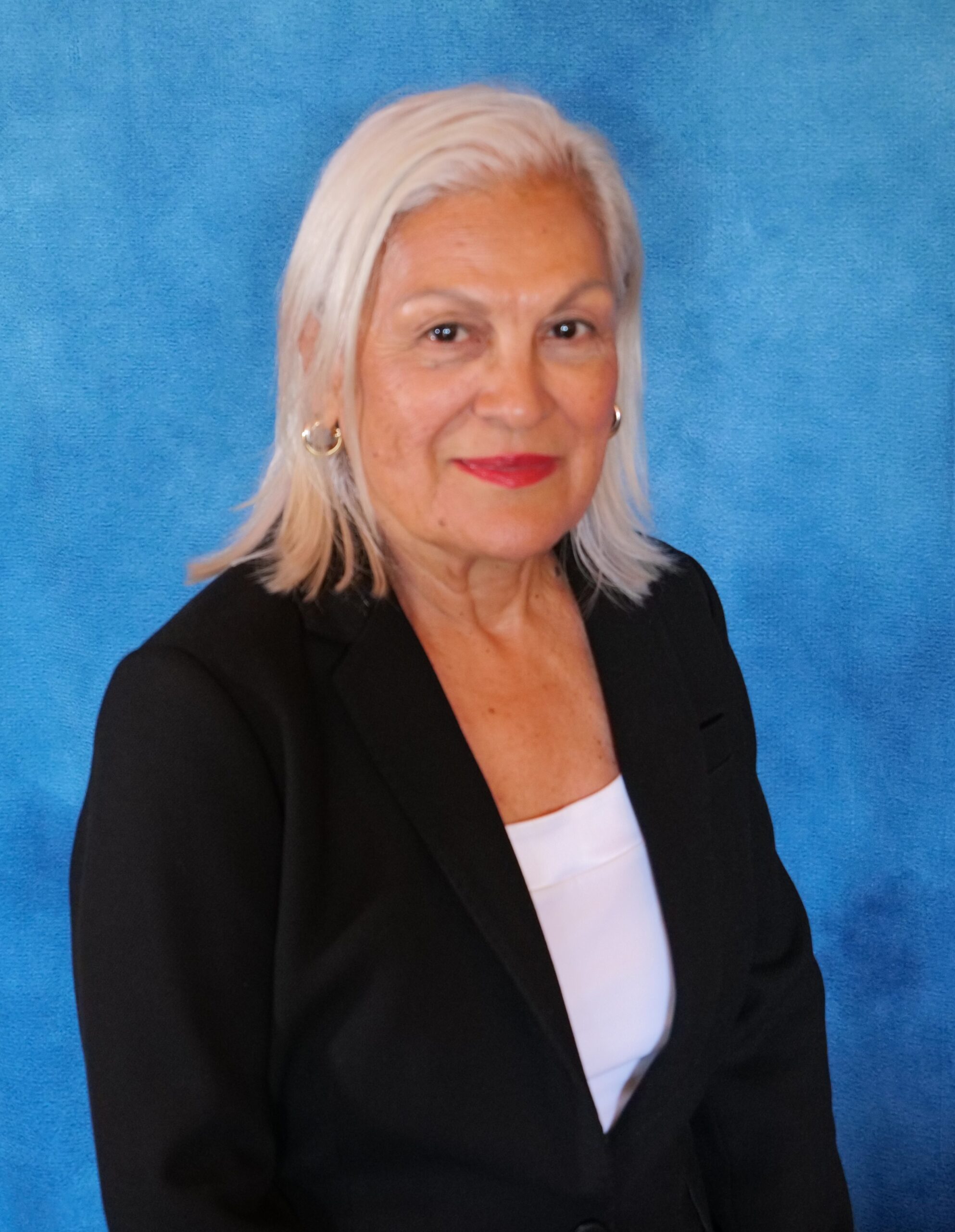 About - Grace Flores-Hughes